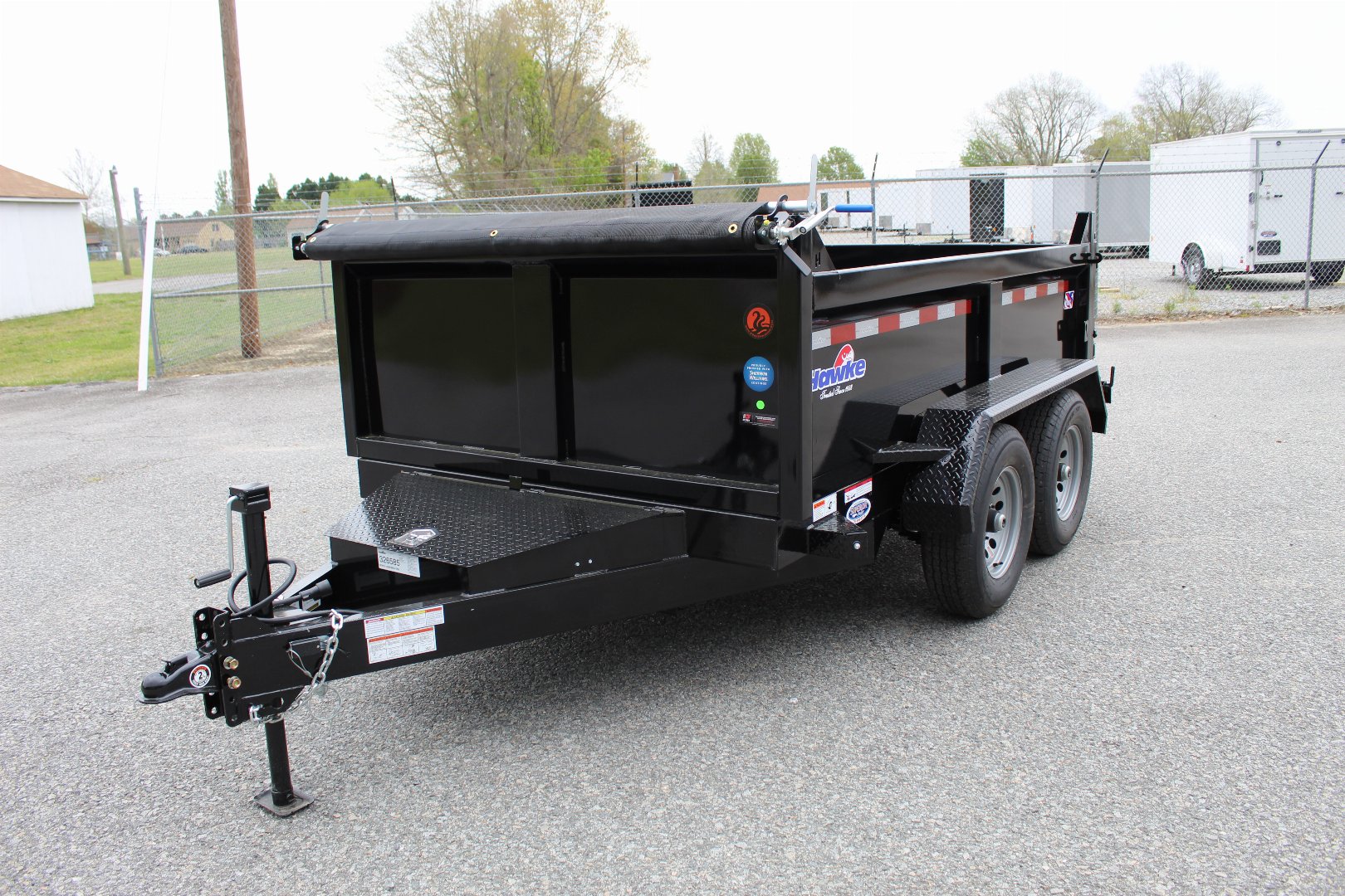 New 2024 HAWKE TRAILERS 6X10 10K Dump w/ Spreader Gate and Ramps Dump ...