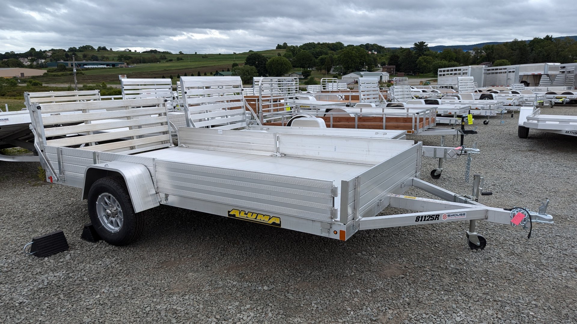 New 2025 Aluma 6'9" x 12 SR Utility Trailer w/ Side Ramps/Solid Rear ...