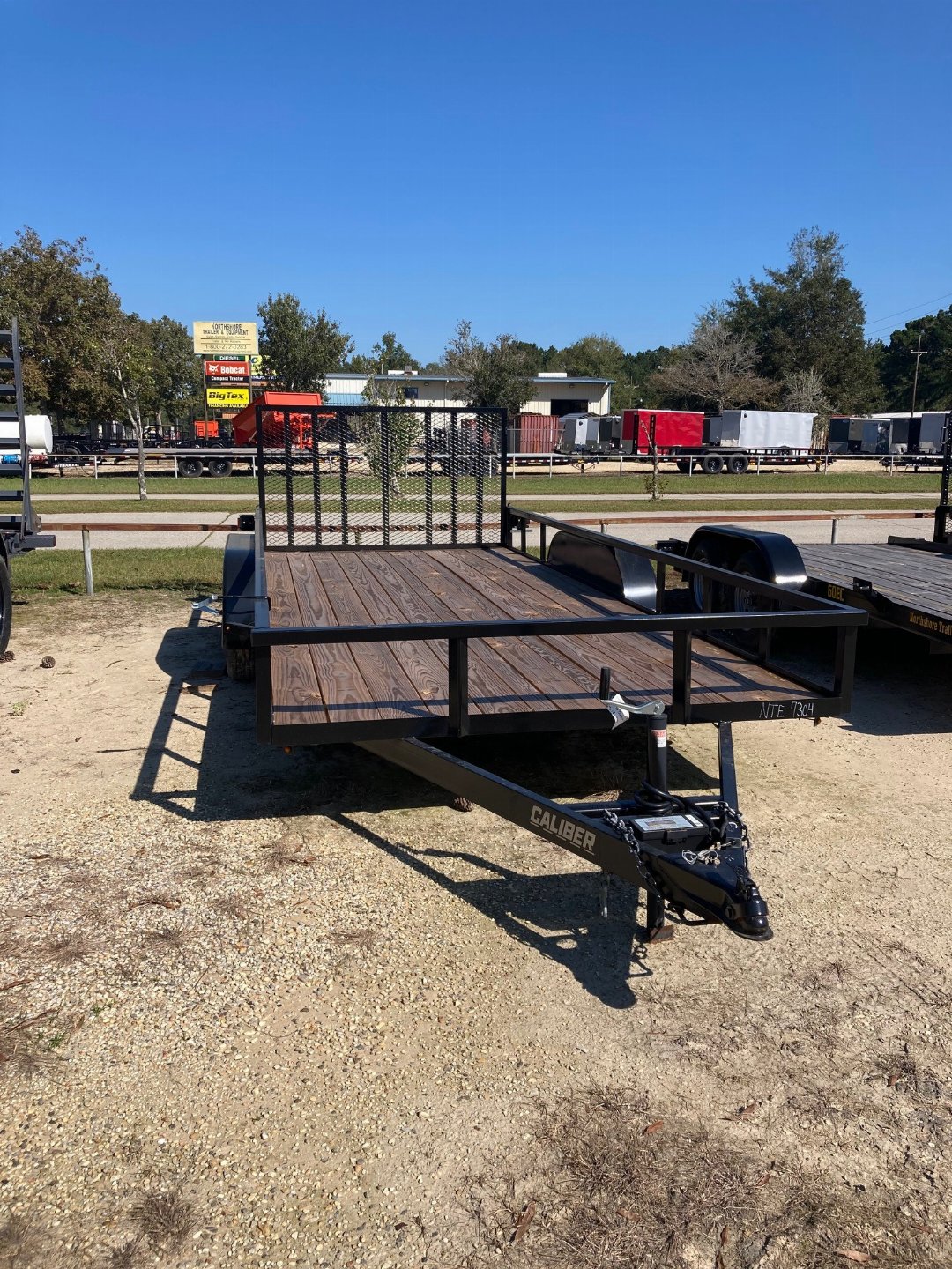 New 2024 Caliber Trailer Mfg 6.10x18 TA WG718 Utility Trailer | Pearl ...