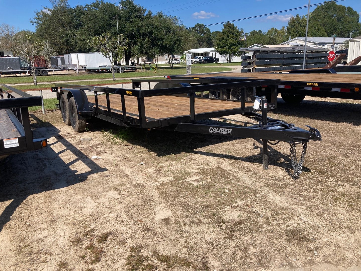 New 2024 Caliber Trailer Mfg 6.10x18 TA WG718 Utility Trailer | Pearl ...