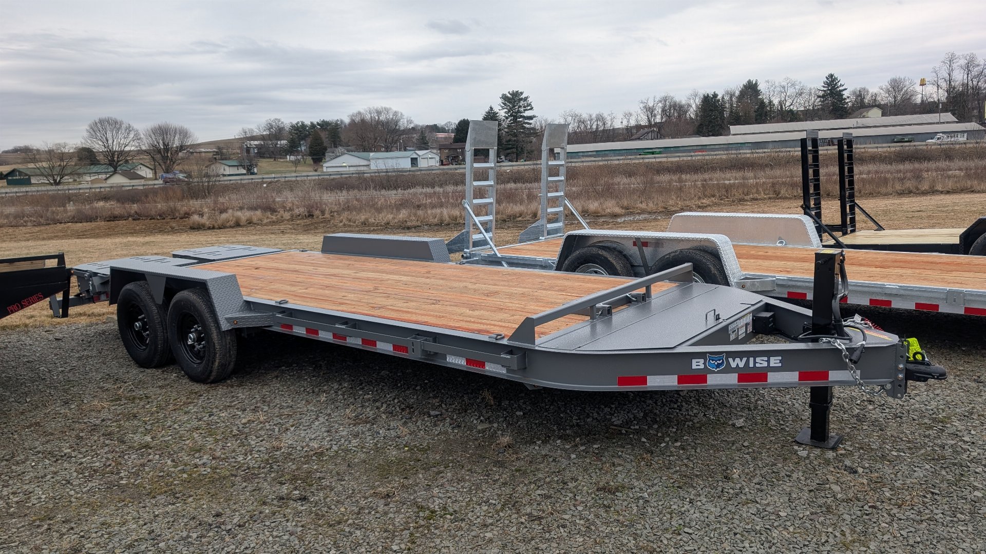 New 2025 BWise 20' (17+3) HD Lo Pro Equipment Hauler w/ Full Width Self ...