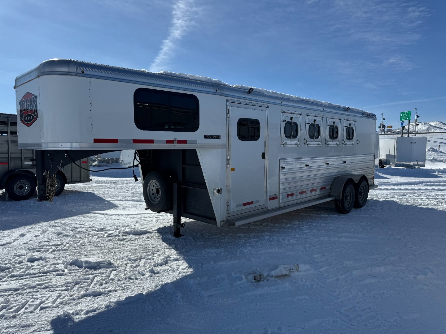 New 2025 LOGAN COACH Bullseye 4H GN w/ DUAL MAN DOORS | Three Forks Montana