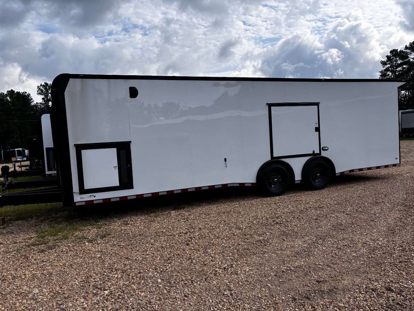 New 2025 8.5X28' RACE TRAILER-ESCAPE DOOR-BLACK OUT TRIM-7' INTERIOR ...