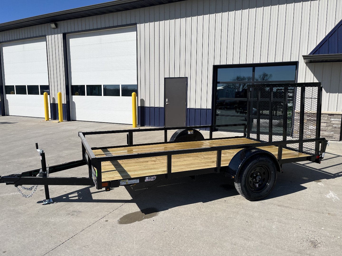 New 2025 H&H 76”x12’ 3k Rail Side Utility Trailer | De Soto Iowa