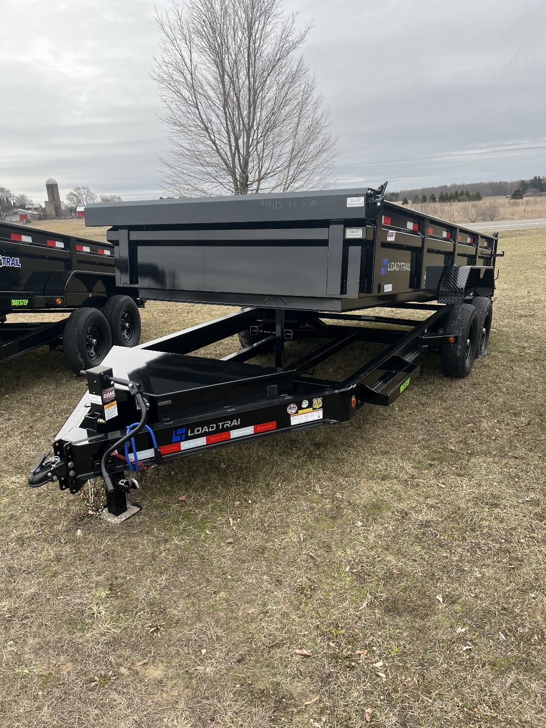 New LOAD TRAIL 83"X14' 2FT WALLS DUMP TRAILER | Grawn Michigan